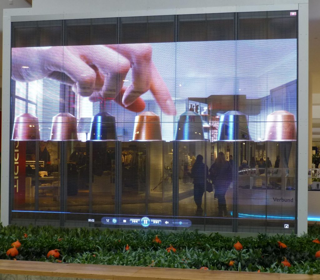 Back to back transparent LED screens in the high end Vienna, Austria ...